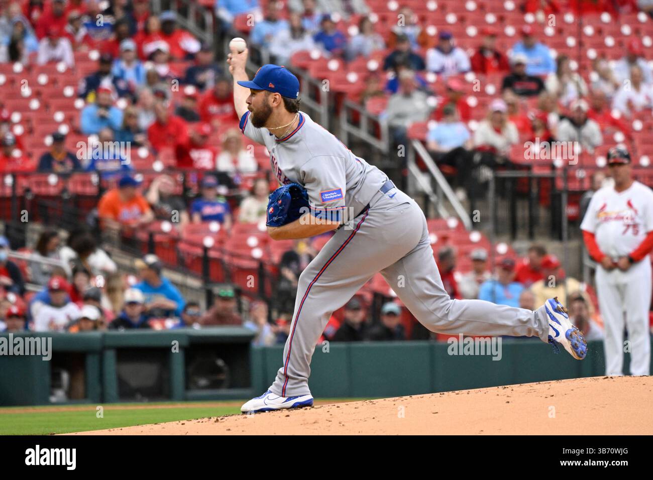 New York Mets starting pitcher Tylor Megill throws in the first inning ...