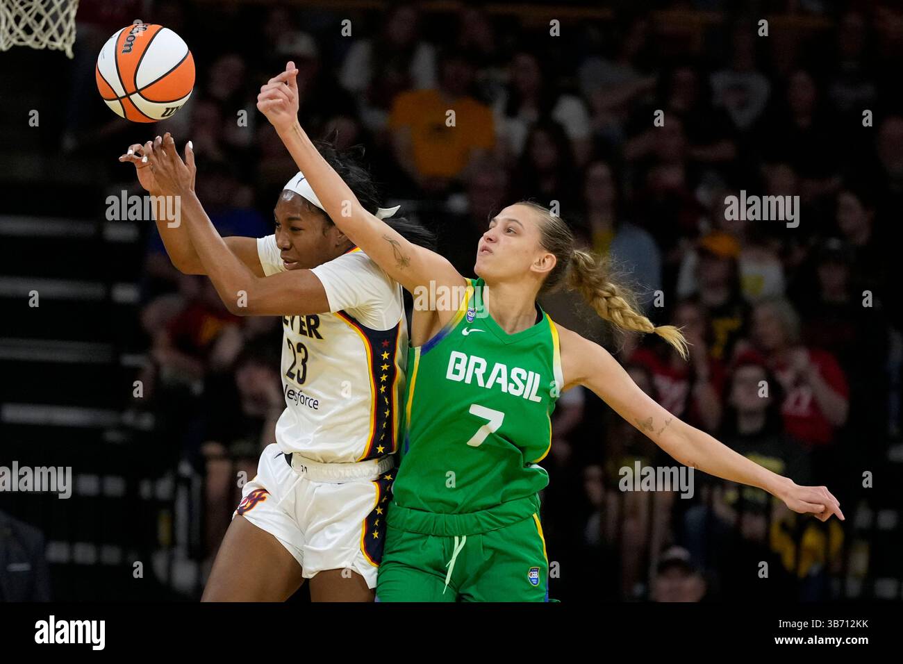 Indiana Fever guard Bree Hall (23) fights for a loose ball with Brazil ...