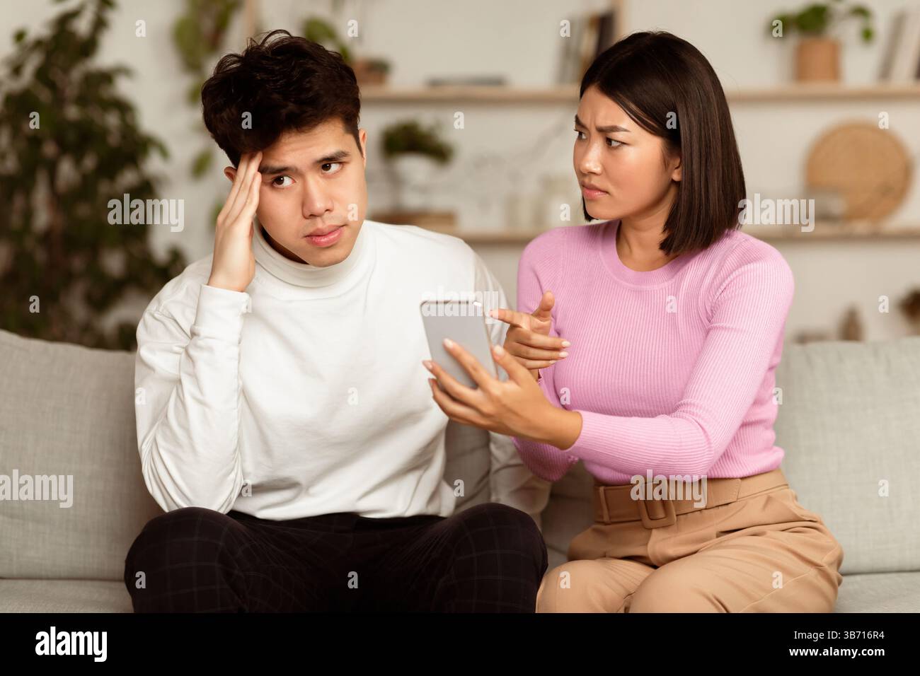 Jealous Korean Wife Showing Cheating Husband His Smartphone At Home ...