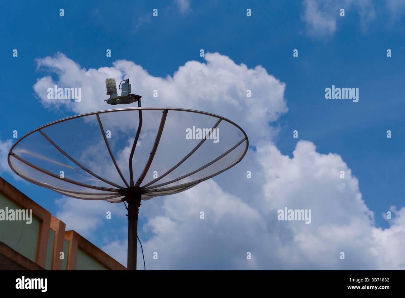 Parabola TV On Top Area With the Blue Cloudy Sky Background Stock Photo ...