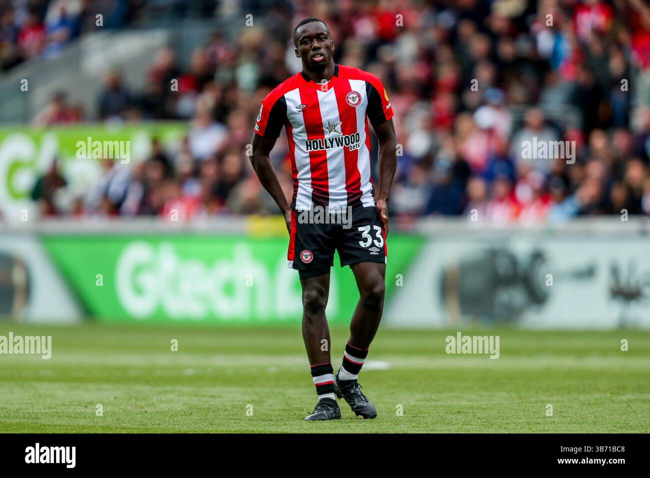 London, UK. 04th May, 2025. Michael Kayode of Brentford looks on during ...