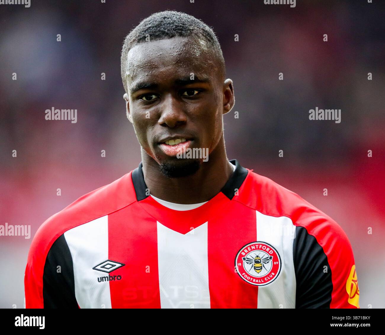 London, UK. 04th May, 2025. Michael Kayode of Brentford looks on during ...