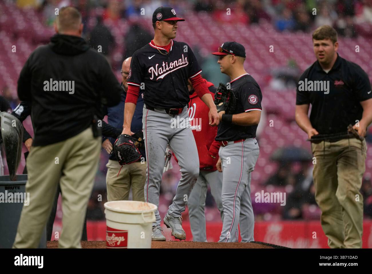 Washington Nationals pitcher MacKenzie Gore, center, stands on the ...