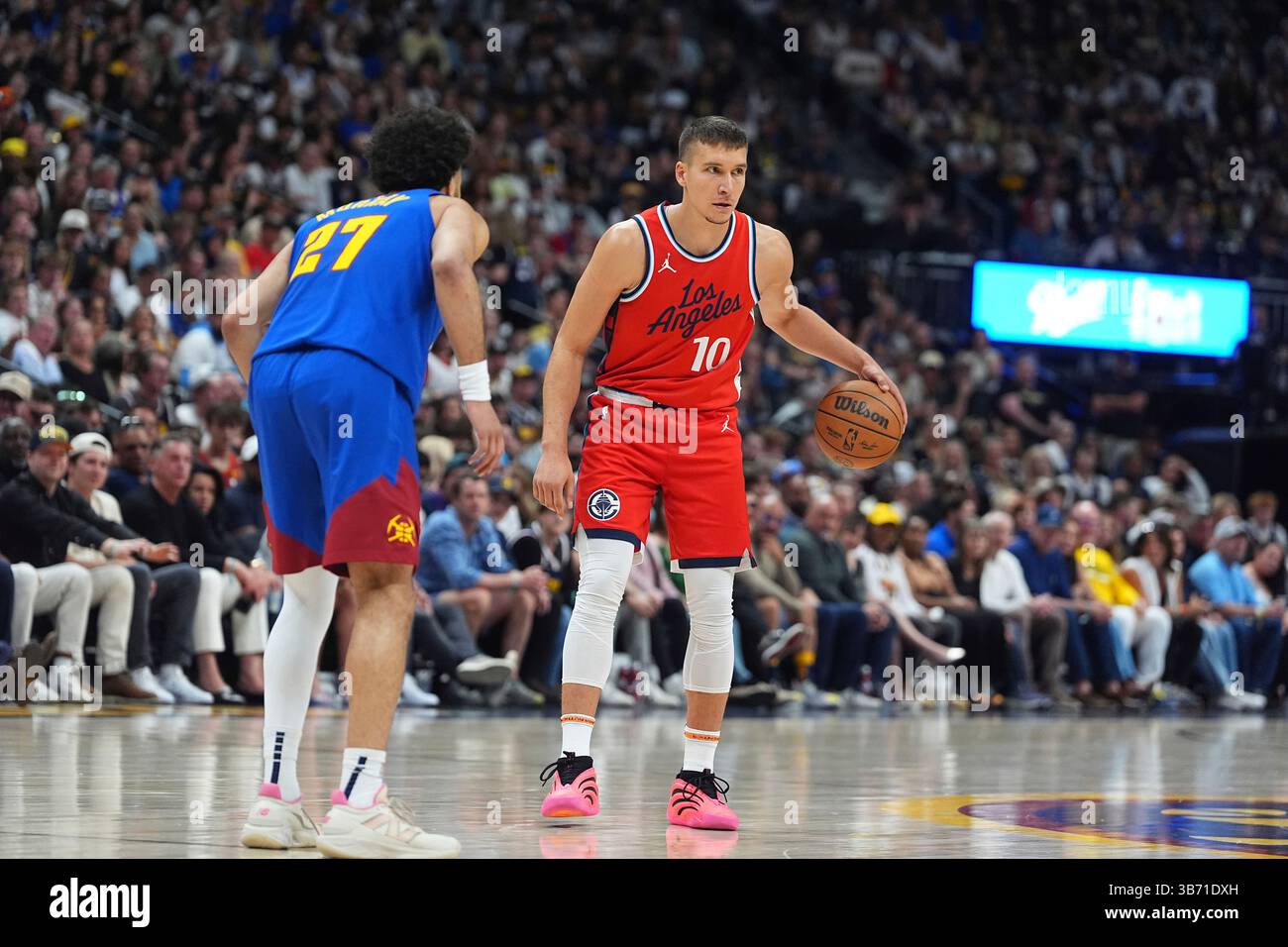 Los Angeles Clippers guard Bogdan Bogdanovic (10) and Denver Nuggets ...