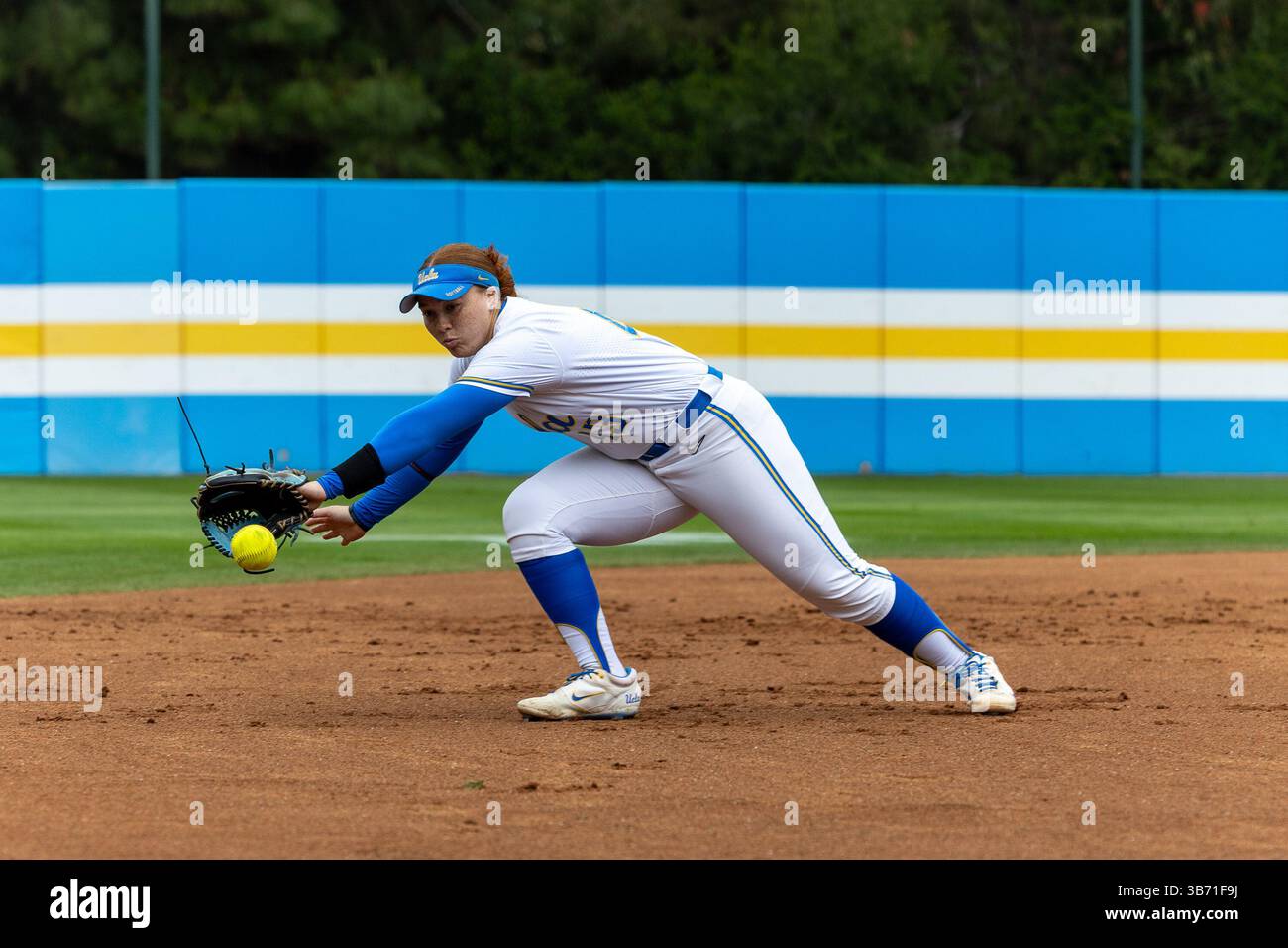 Easton Stadium, Los Angeles, USA. 4th May, 2025. UCLA's first baseman Megan Grant (43) warms up ...