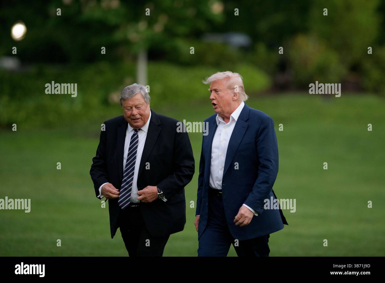 President Donald Trump, right, is joined by first lady Melania Trump's ...