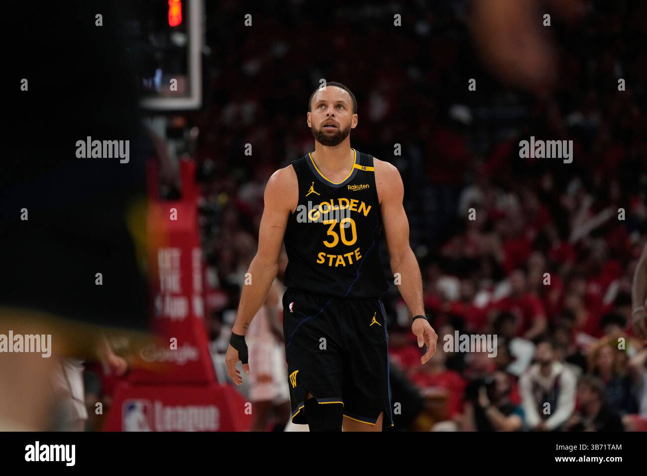Golden State Warriors' Stephen Curry walks to the bench during the ...