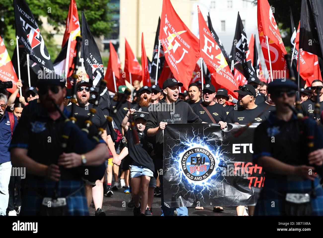 Members of the Electrical trade Union march at the Labor Day rally in ...