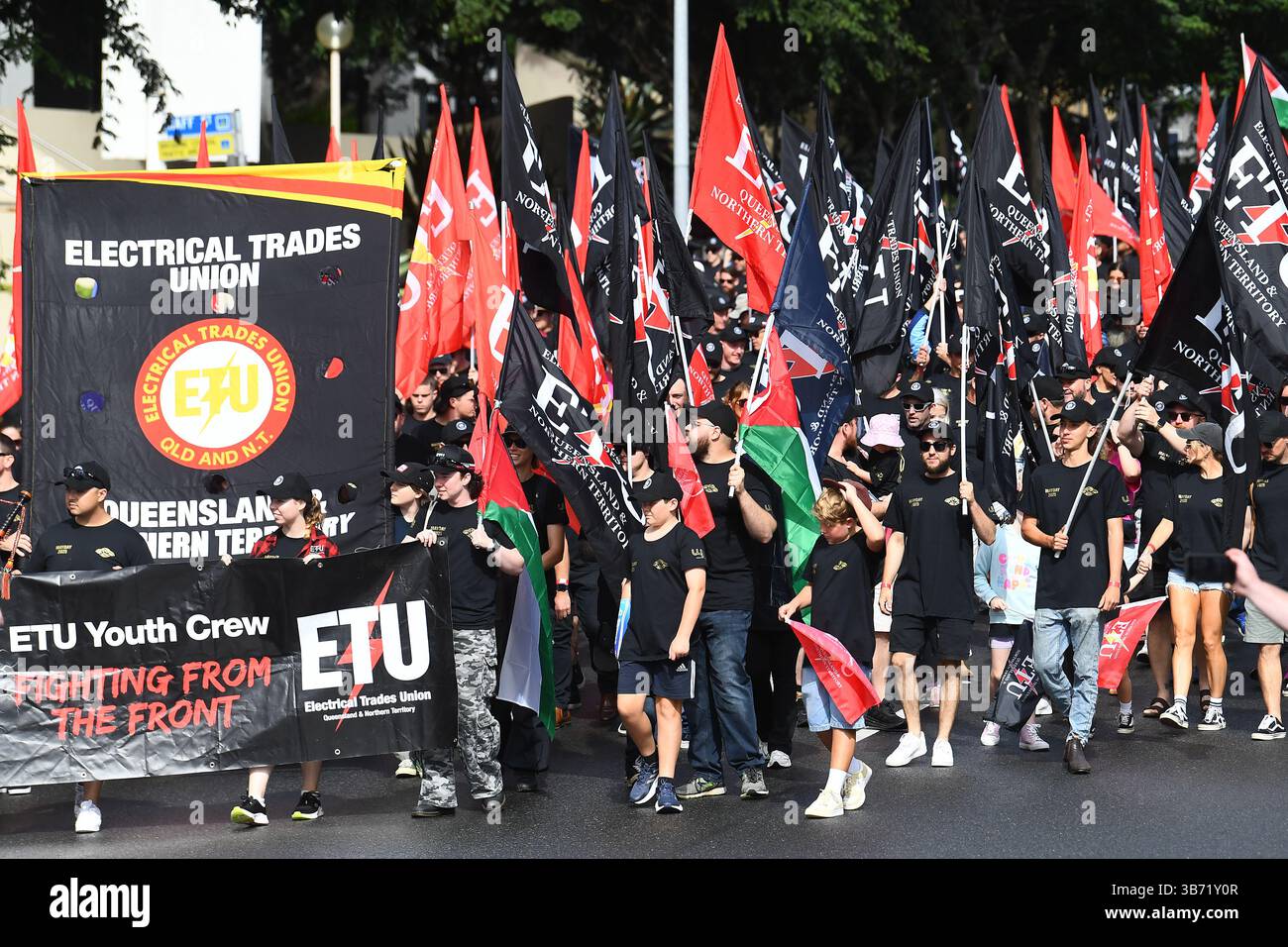 Members of the Electrical trade Union march at the Labor Day rally in ...