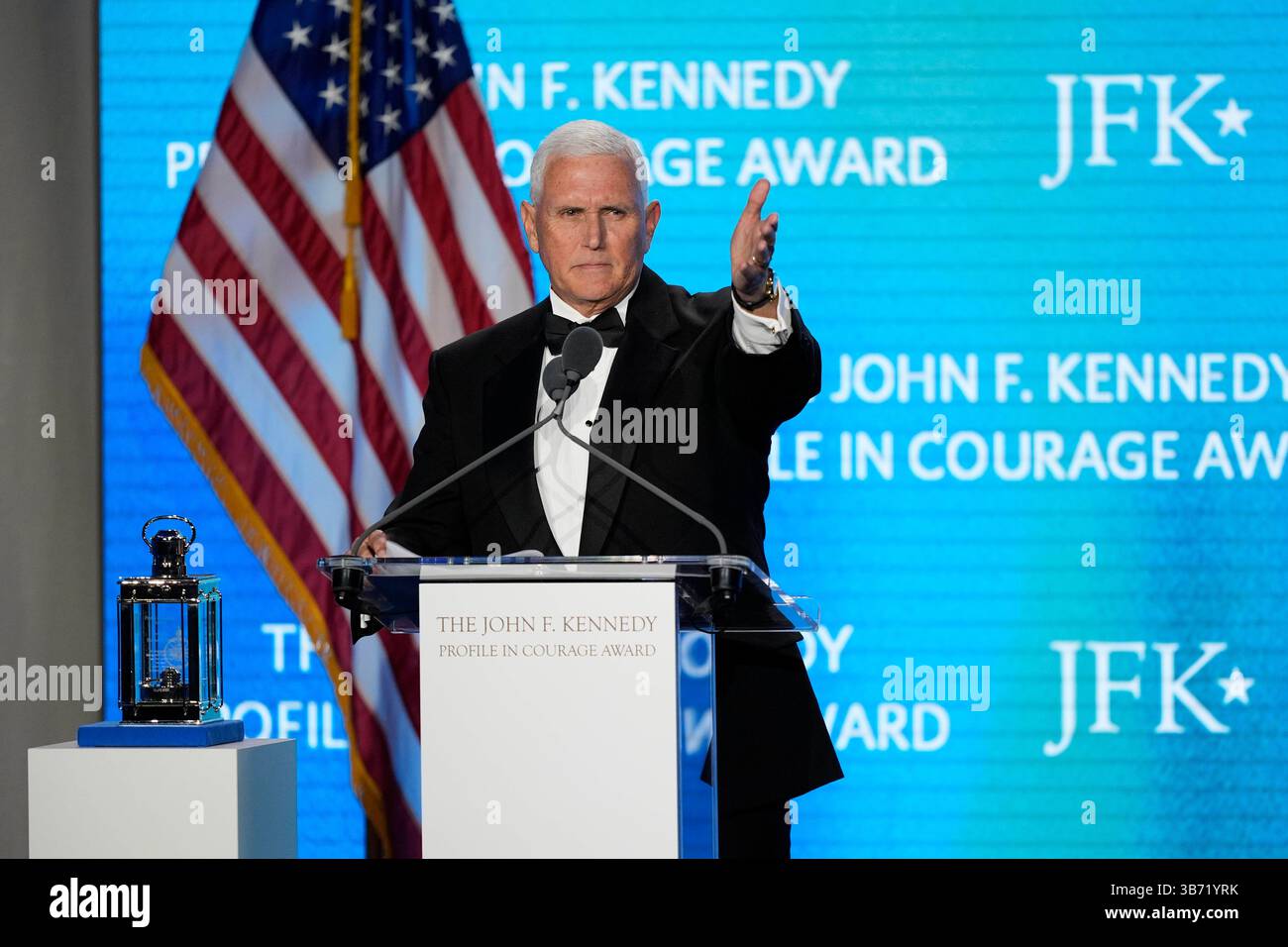 Former Vice President Mike Pence acknowledges his staff members as he ...