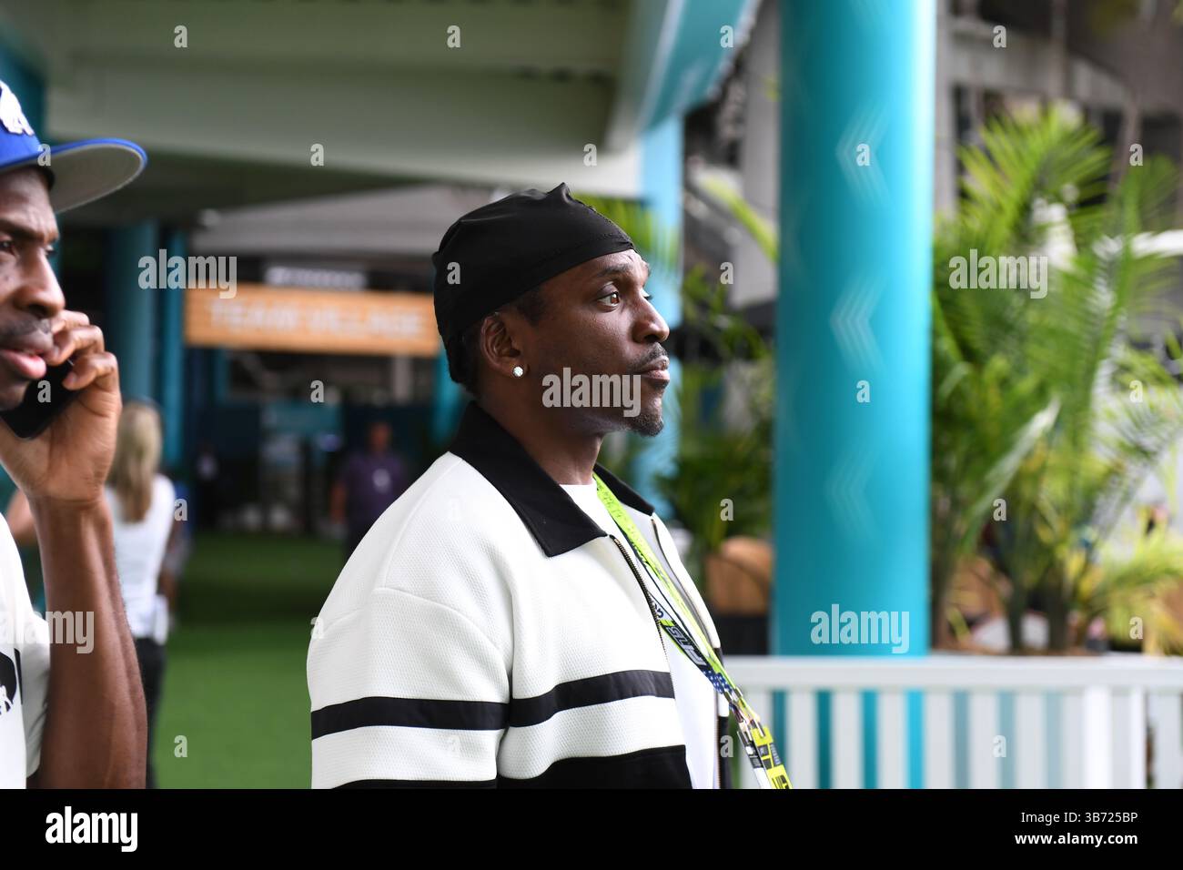 Miami, USA. 04th May, 2025. Rapper Pusha T walks through the Paddock ...