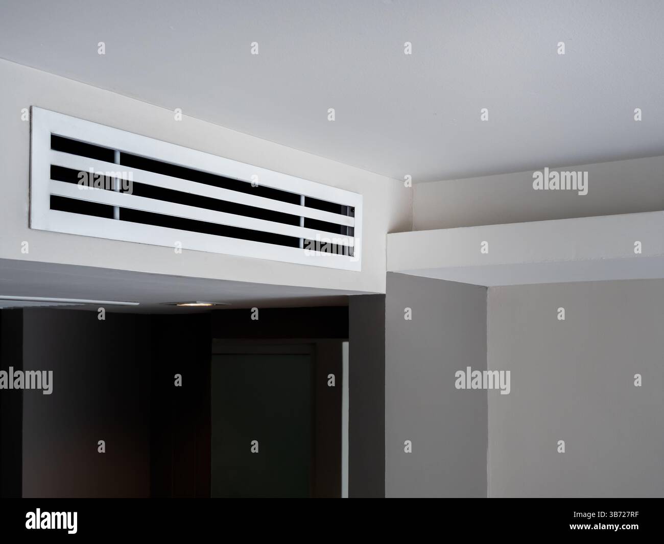Scene of air conditioning wall mounted ventilation system on ceiling in ...