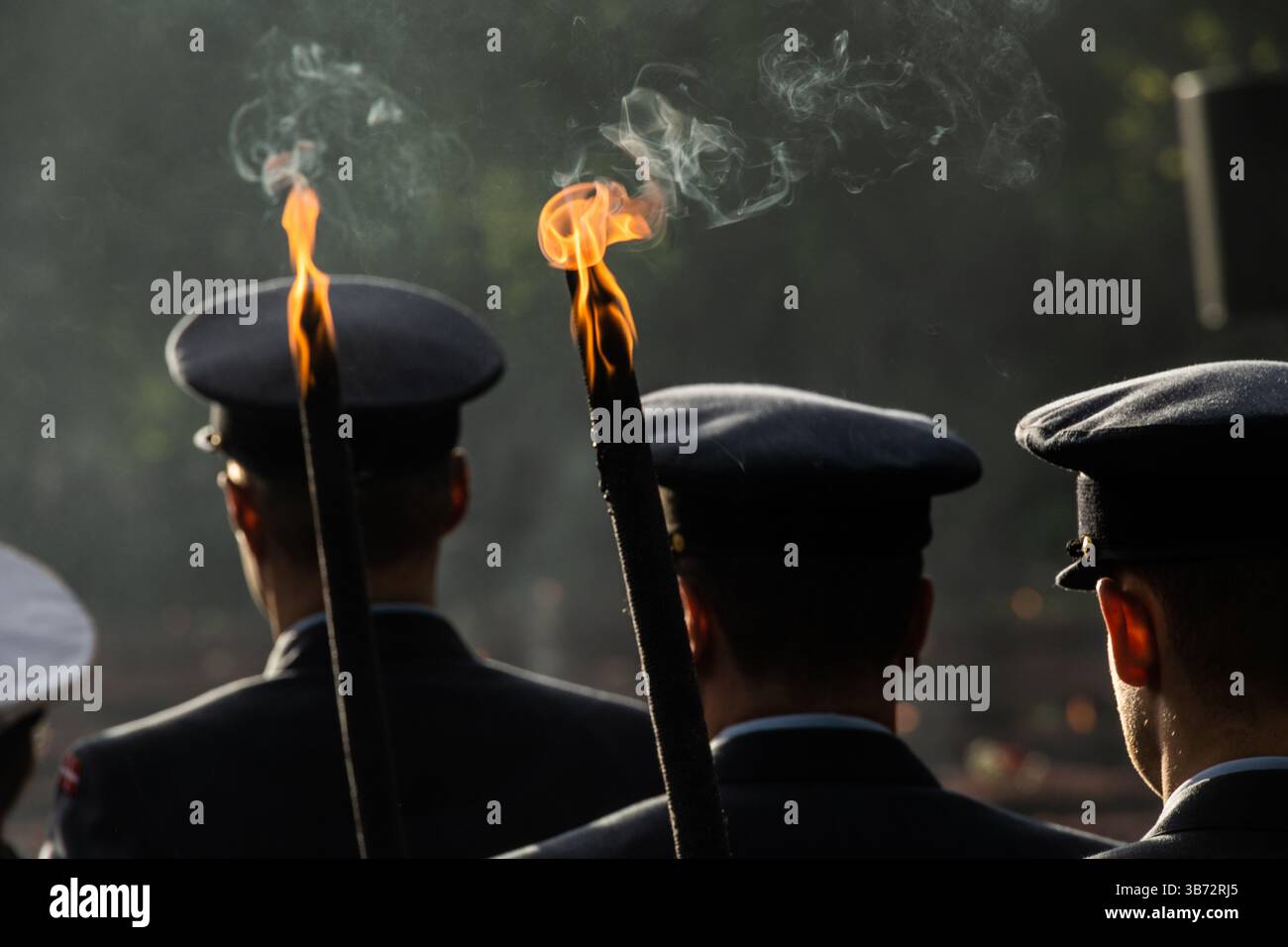 Hellerup, Denmark. 04th May, 2025. Soldiers march with torches during ...