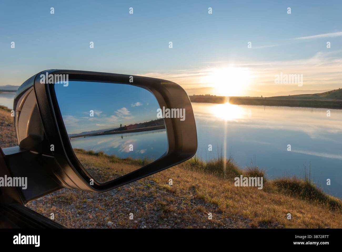 Scenic water of canals landscape and in reflected in rear vision mirror ...