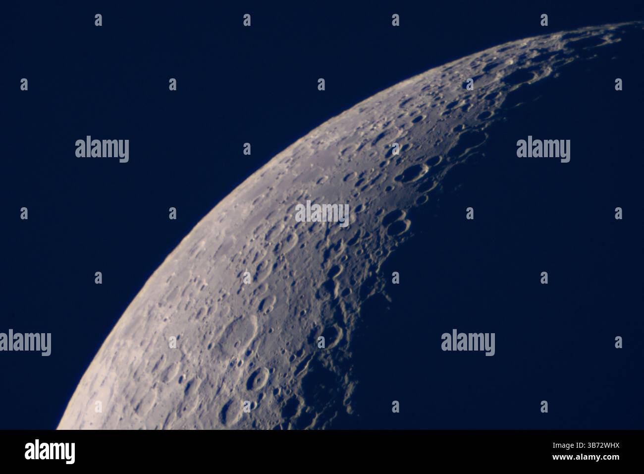 Low solar angle casts deep shadows across cratered lunar limb ...