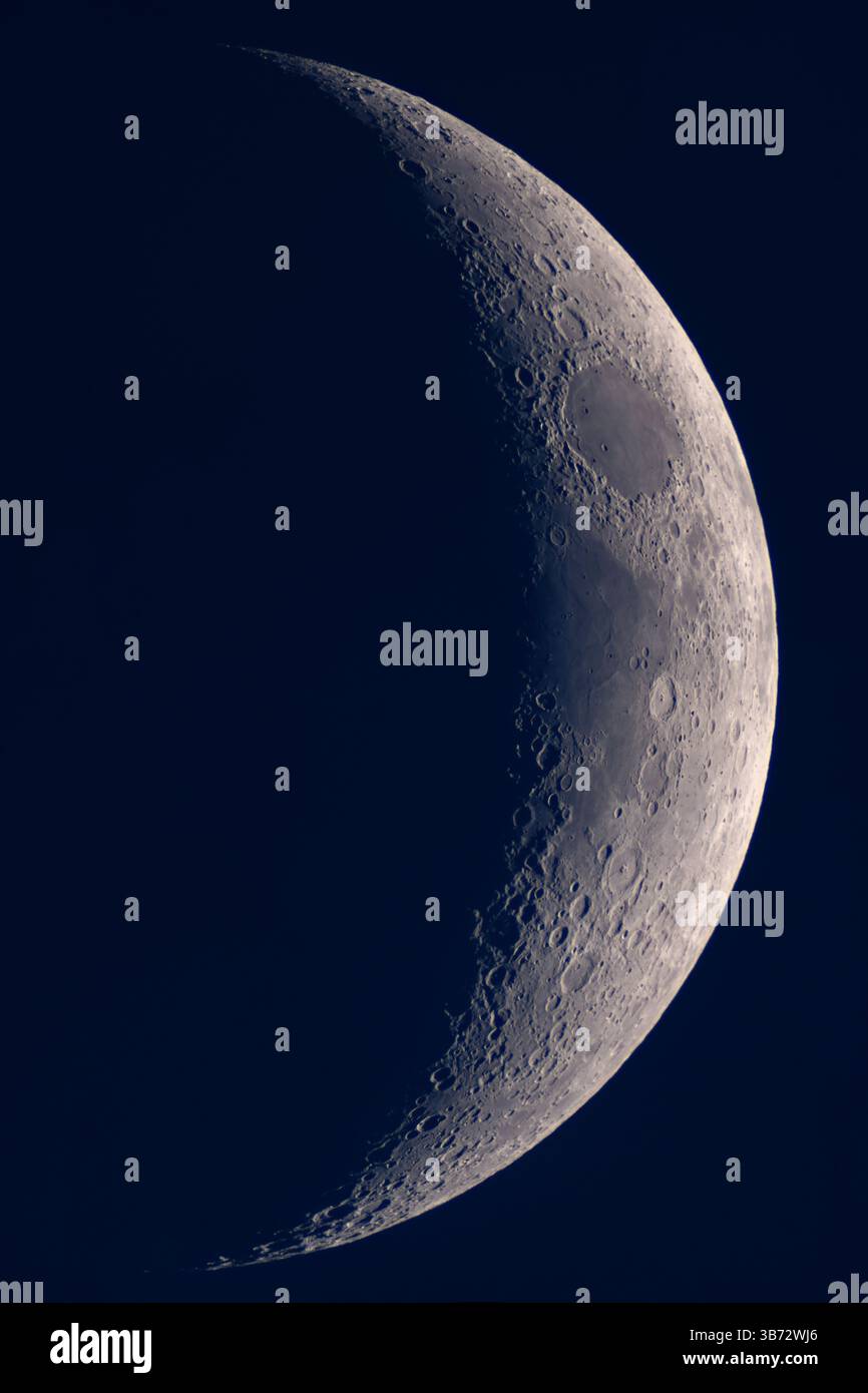 Vertical panoramic crescent Moon terminator reveals crater rim detail ...