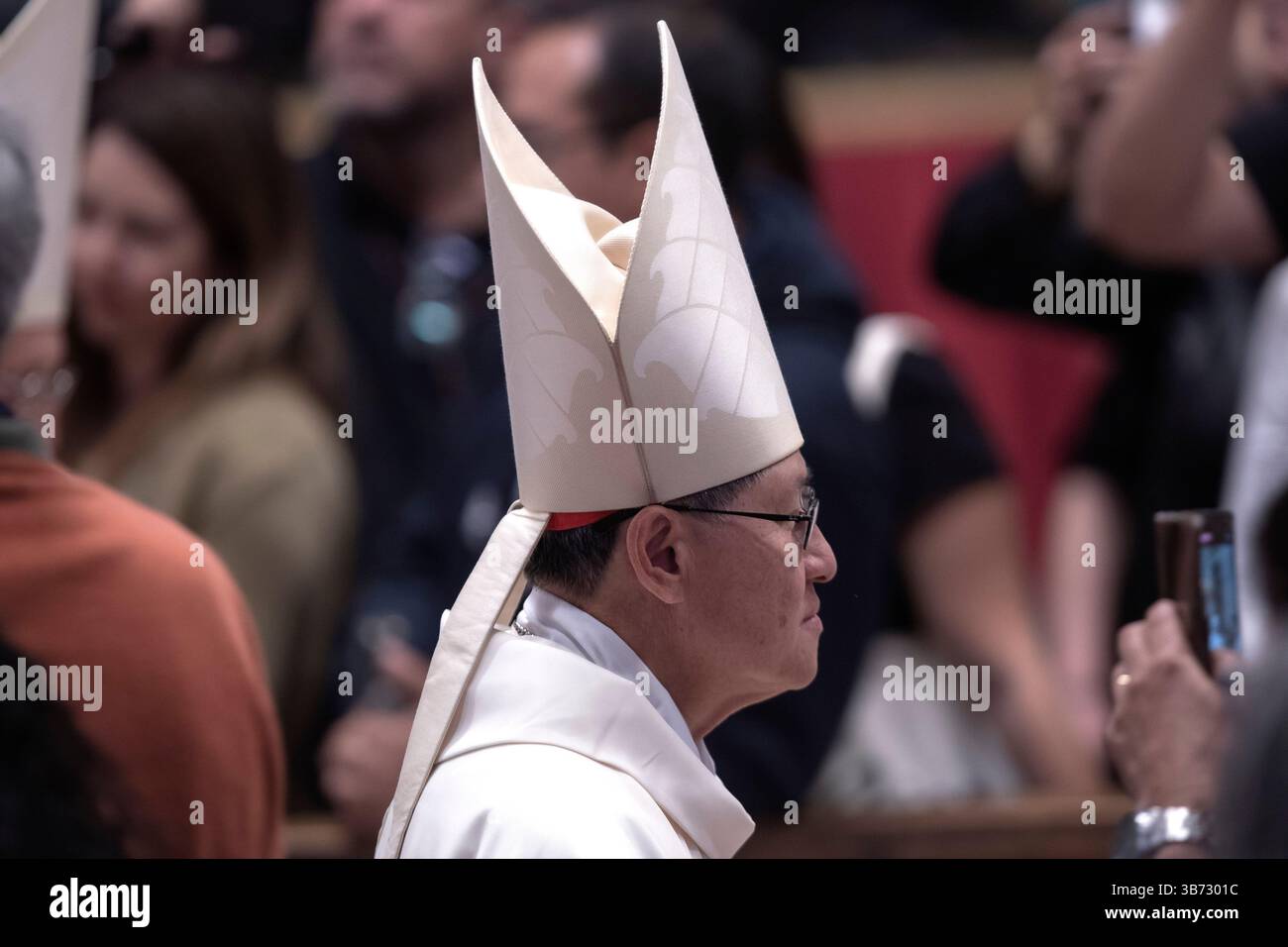 Cardinal Luis antonio tagle attends mass on the ninth day of the ...