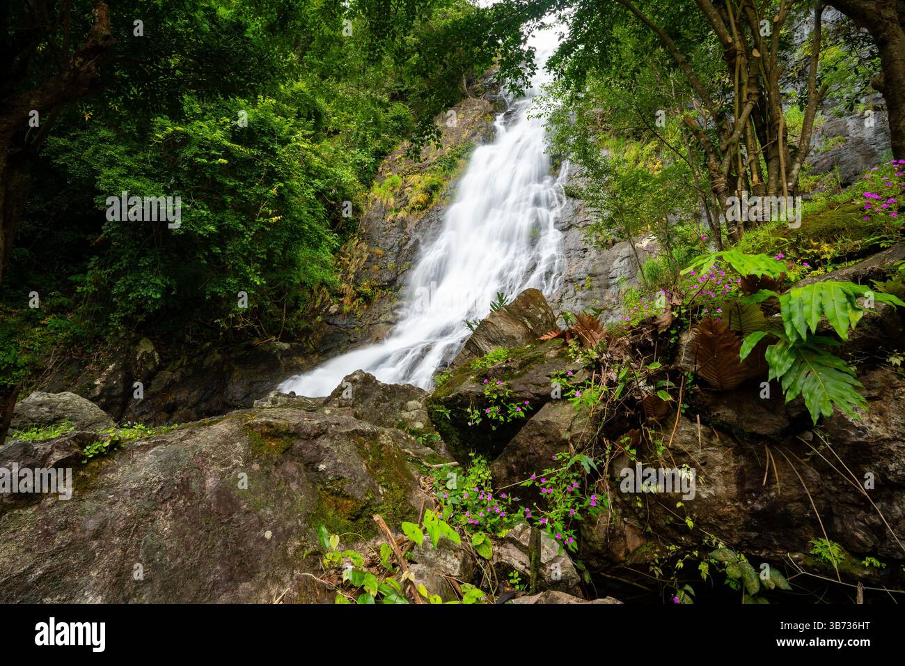 Sarika waterfall with rocks in the foreground beautiful waterfall in ...