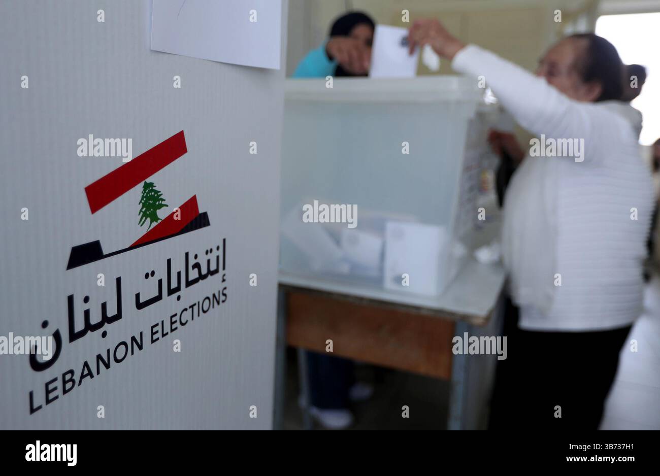 Beirut, Lebanon. 4th May, 2025. A Lebanese woman votes at a polling ...