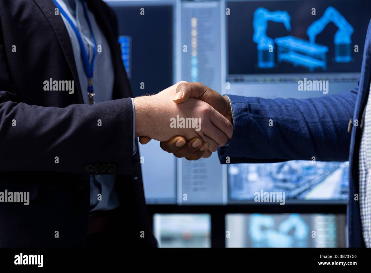 Investor shaking hands with factory manager after finding no safety ...