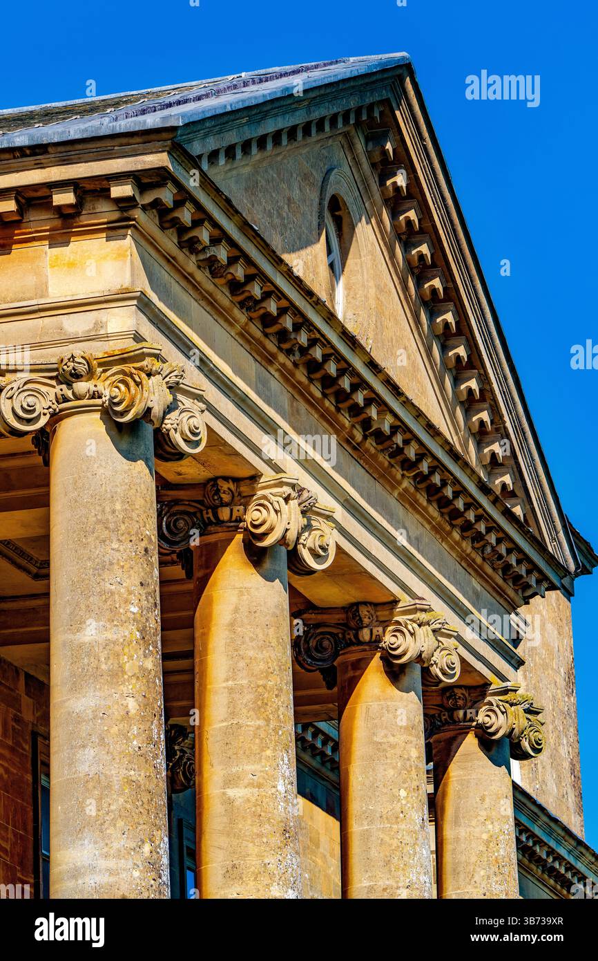 Neoclassical Ionic portico with volute capitals and dentil cornice on ...