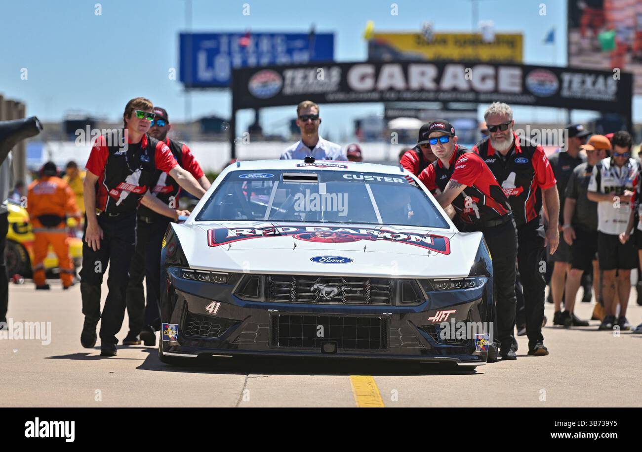 FORT WORTH, TX - MAY 04: Crew members push Cole Custer's #41 Haas ...