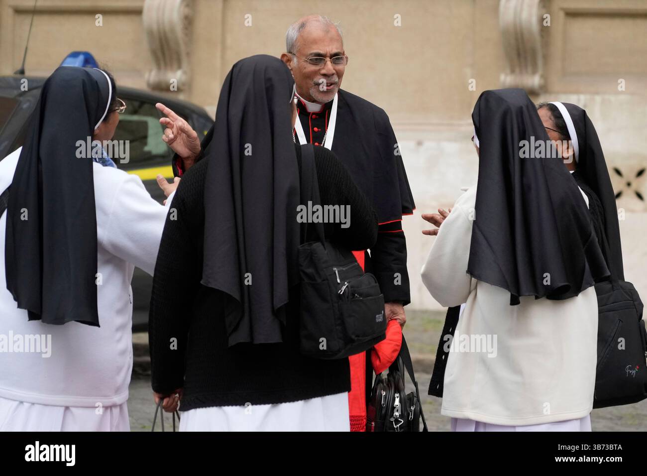 Cardinal Filipe Neri Ferrao arrives at the Vatican, Monday, May 5, 2025 ...