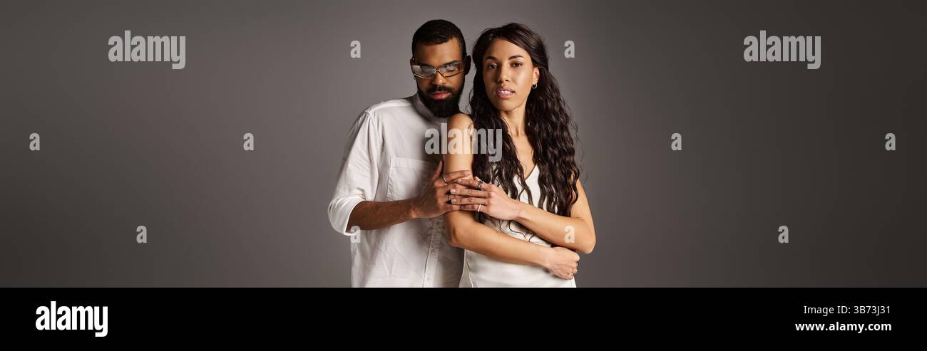 A fashionable couple showcases their connection in a contemporary ...