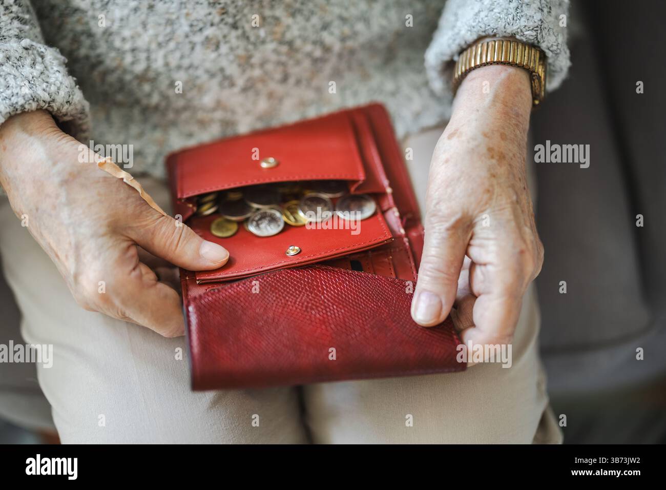 Broken purse money coins hi-res stock photography and images - Alamy