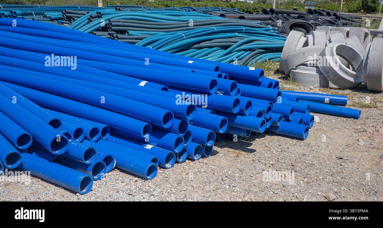 Blue PVC pipes, plastic pipes for water supply Stock Photo - Alamy
