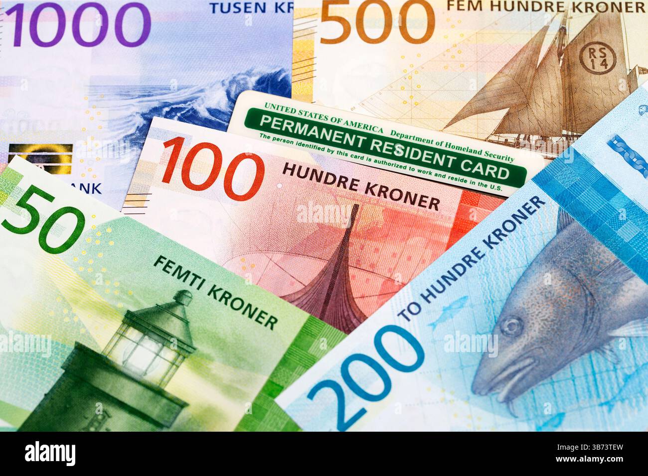 American permanent resident card on Norwegian money - Krone Stock Photo ...