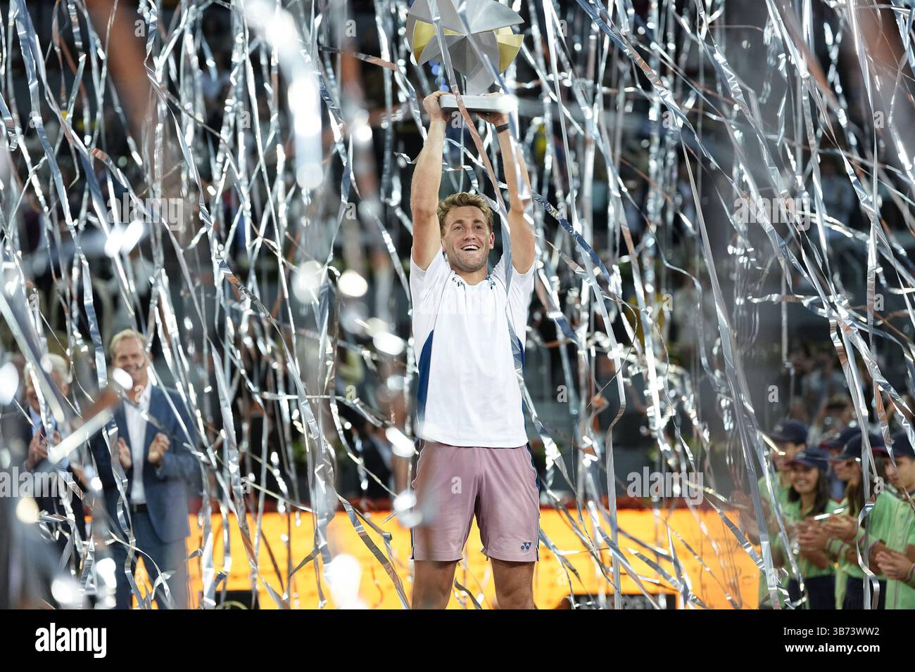 Casper Ruud of Norway celebrates with the champion trophy after winning ...