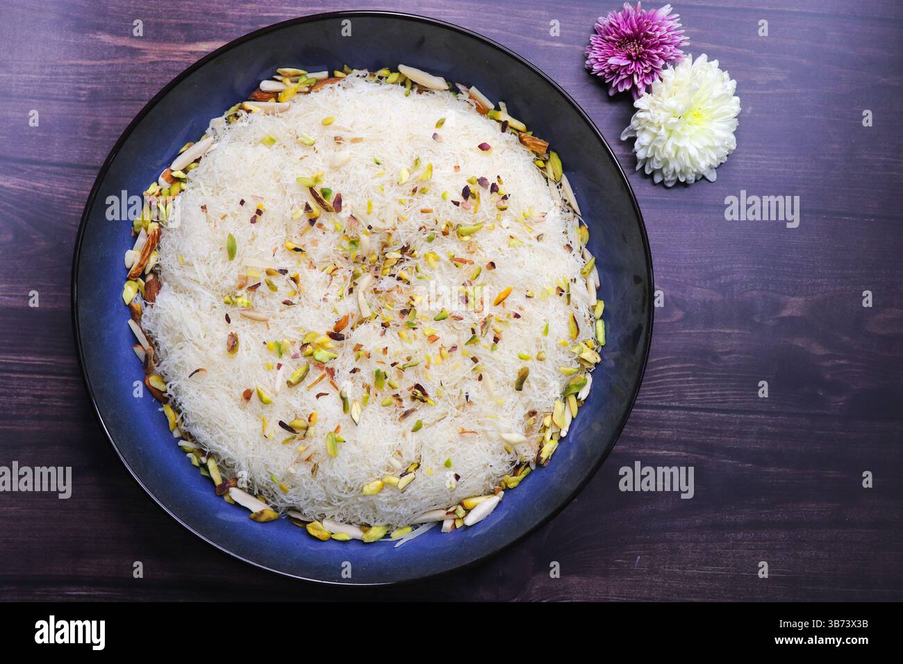 Closeup of Sutarfeni, a traditional Indian sweet made from fine sev ...