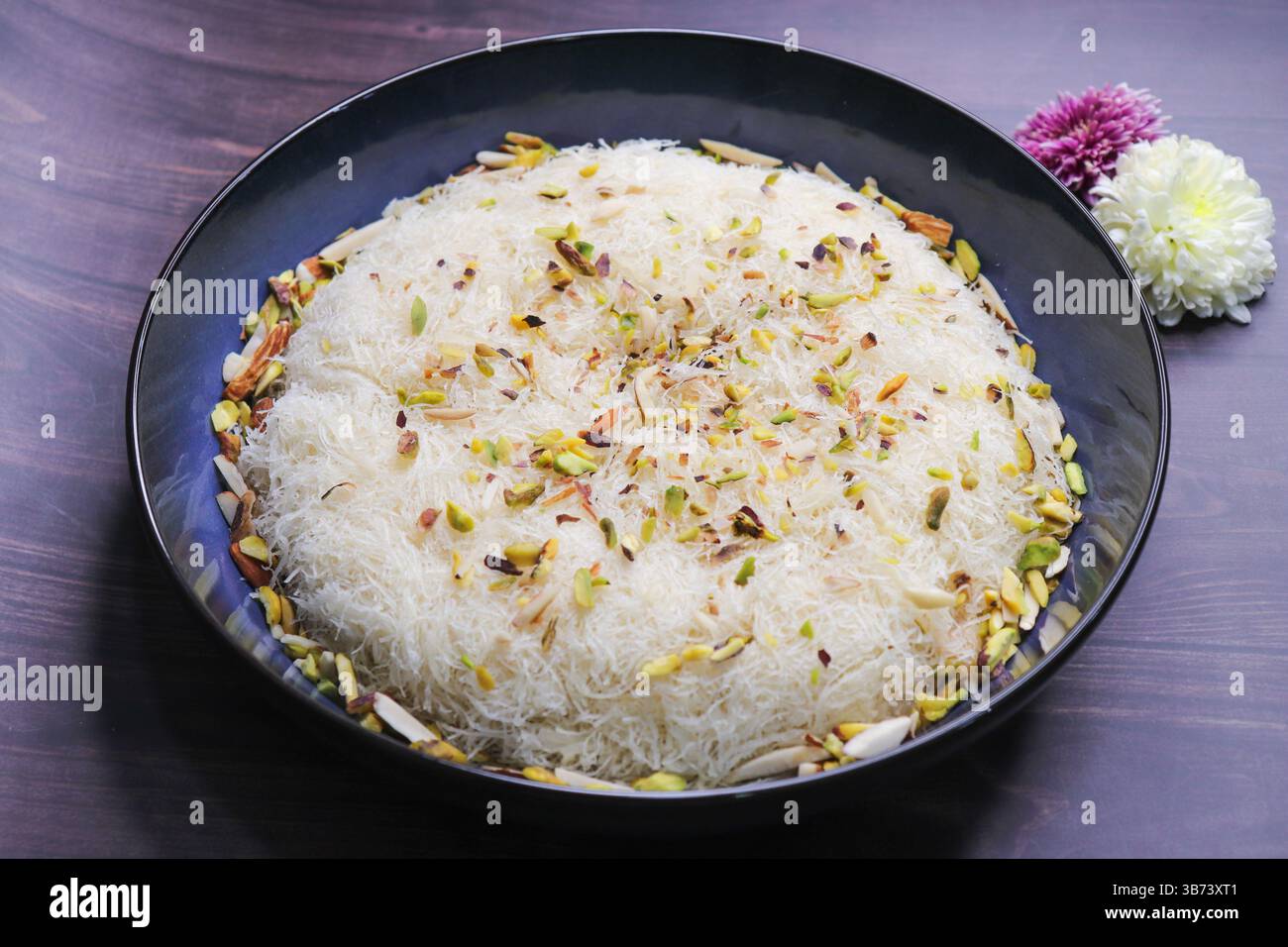 Closeup of Sutarfeni, a traditional Indian sweet made from fine sev ...