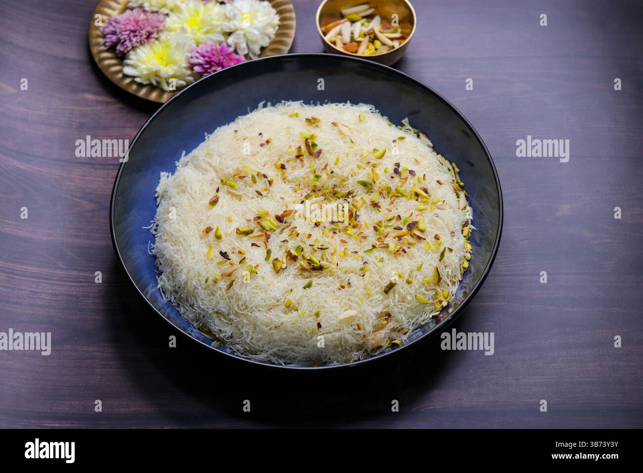 Closeup of Sutarfeni, a traditional Indian sweet made from fine sev ...