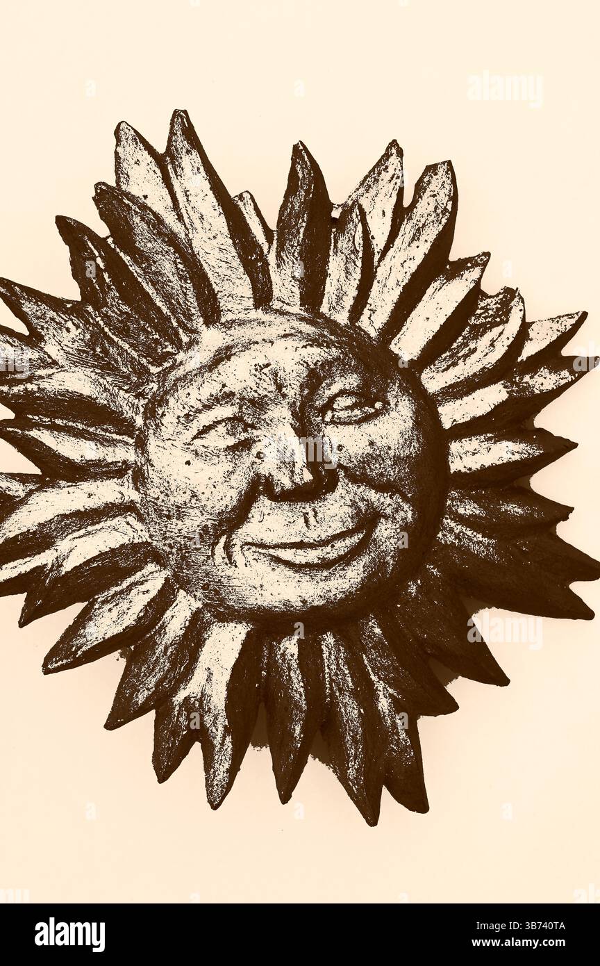 Sepia image of plaster model of smiling sun face with kind but world ...