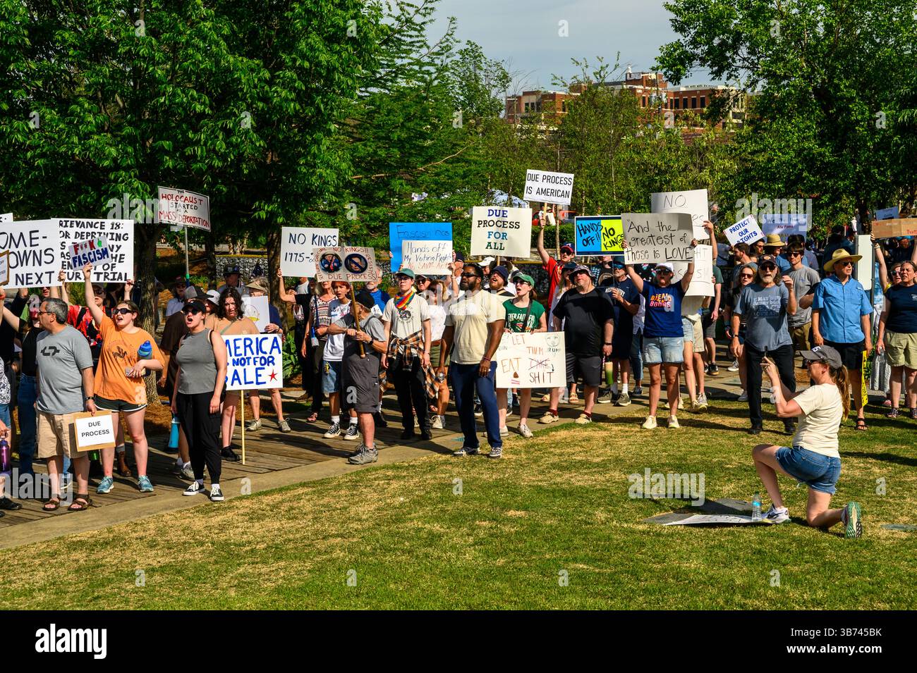 Carrying protest signs hi-res stock photography and images - Alamy