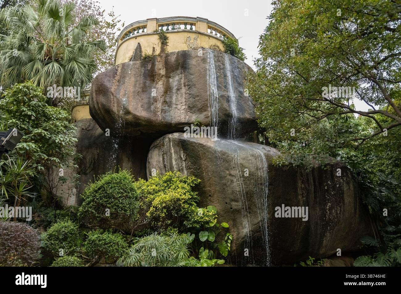 Stone fountain in the Camoes Garden in Macau Stock Photo - Alamy