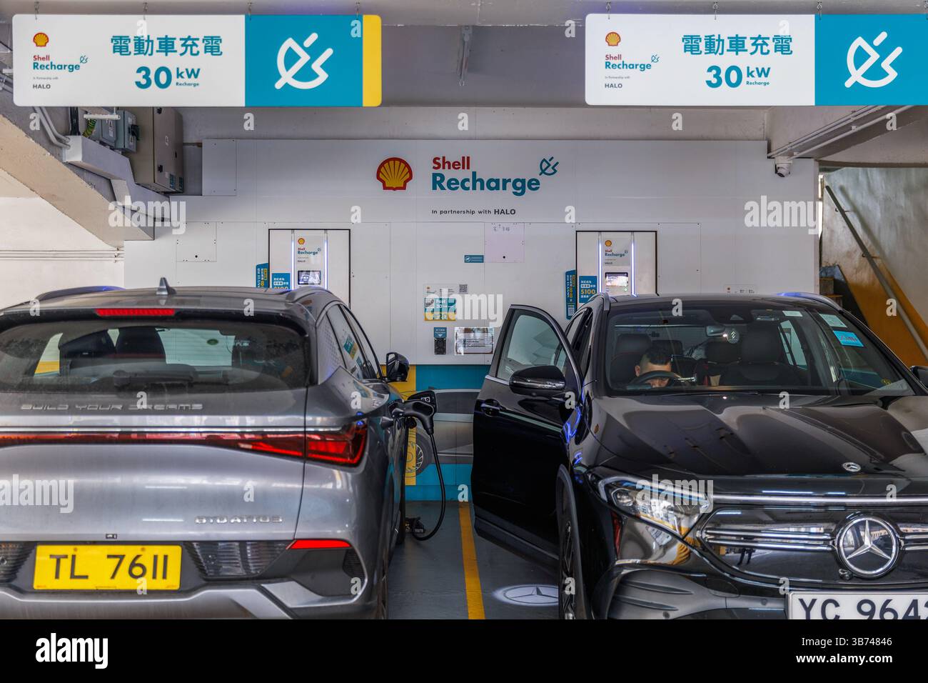 Hong Kong, China. 11th Mar, 2025. A man wait inside the car while ...