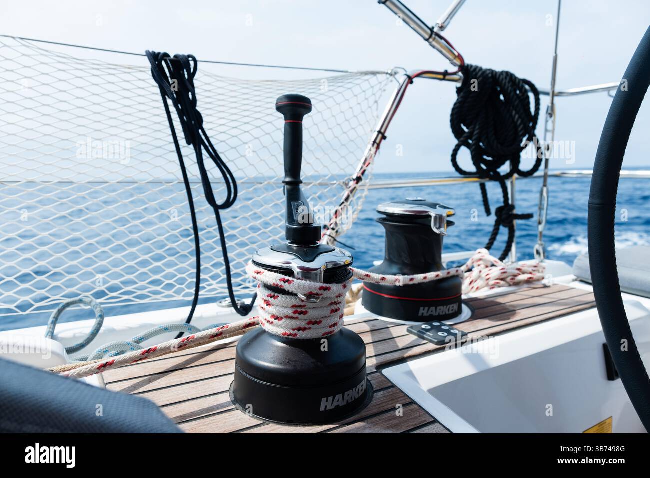 Sailing yacht ropes and winch. Sailboat equipment details. Water ...
