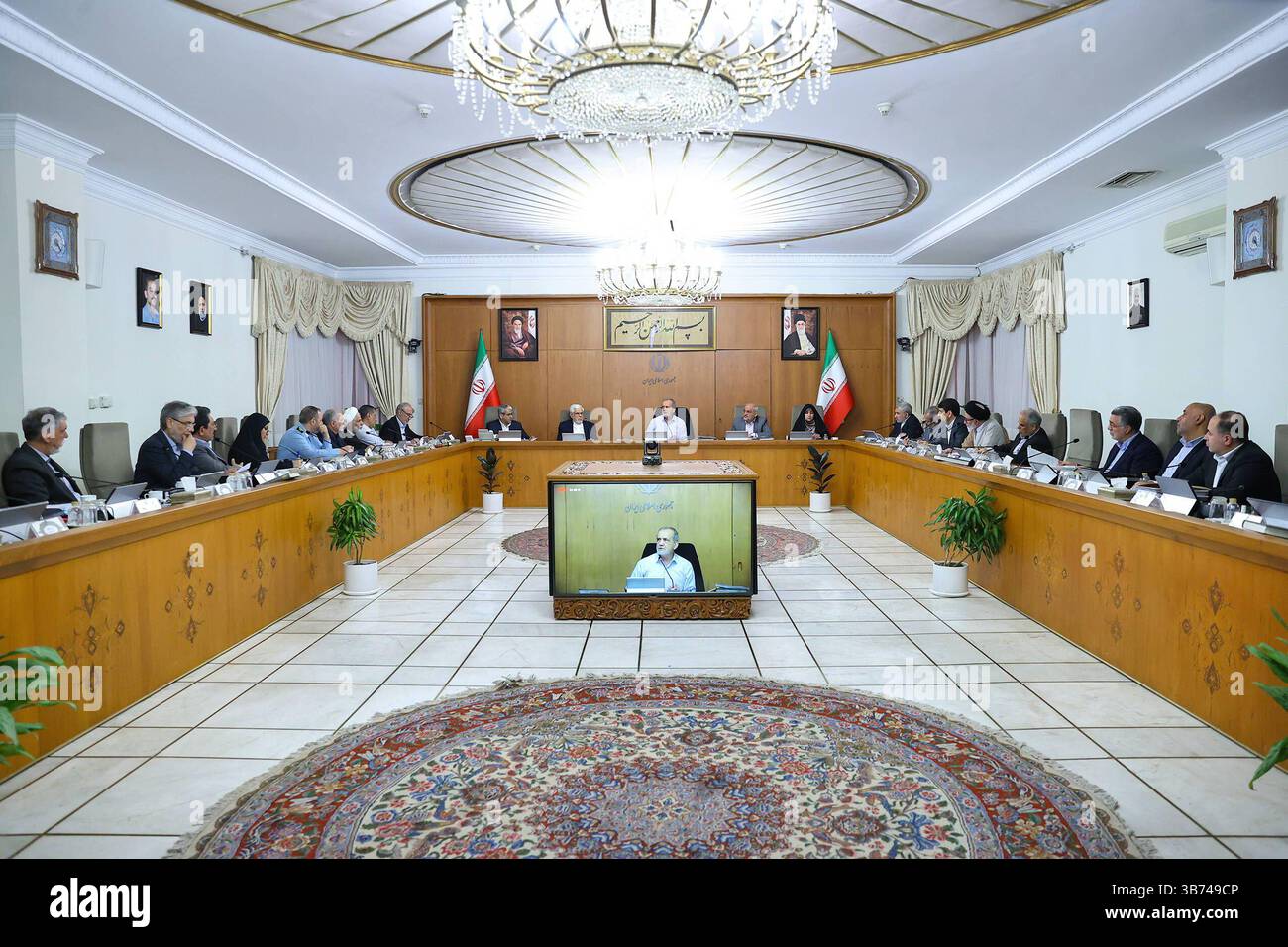 Iranian President Masoud Pezeshkian chairs a cabinet meeting Iranian ...