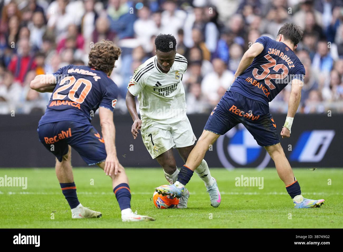Vinicius Junior of Real Madrid and Javi Rodriguez of Celta de Vigo ...