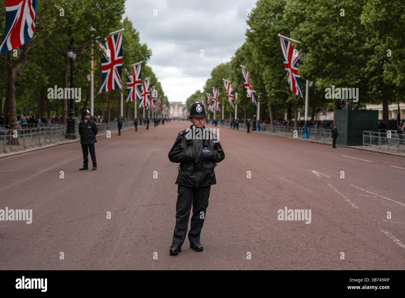 Police officers guard The Mall ahead of a military procession marking ...