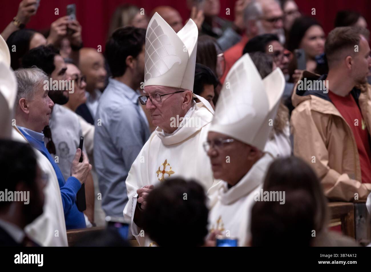 Cardinal Pietro Parolin arrives for a mass on the ninth day of the ...