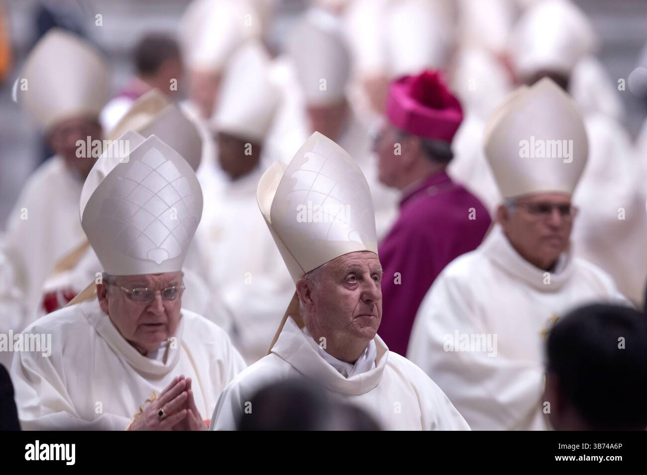 Cardinal Giuseppe Versaldi attends mass on the ninth day of the ...