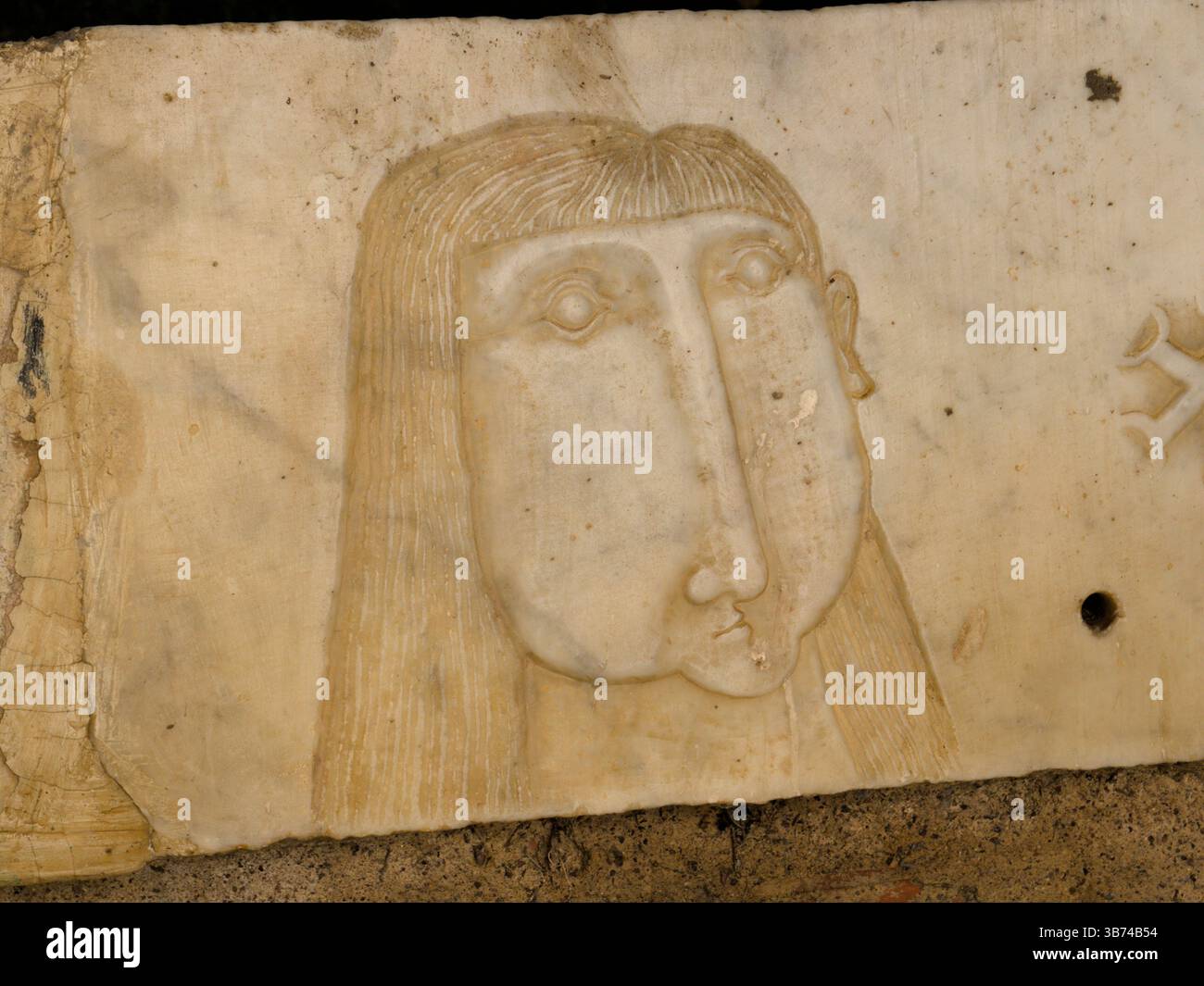 Carved Stone Artwork with Abstract Human Face Design, France Stock ...