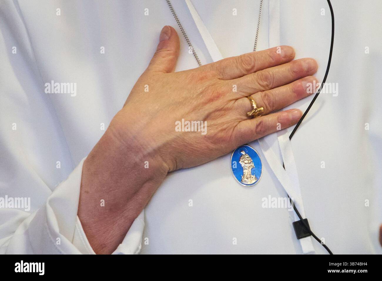 A nun prays during a congress of nearly 900 superiors of the world's ...