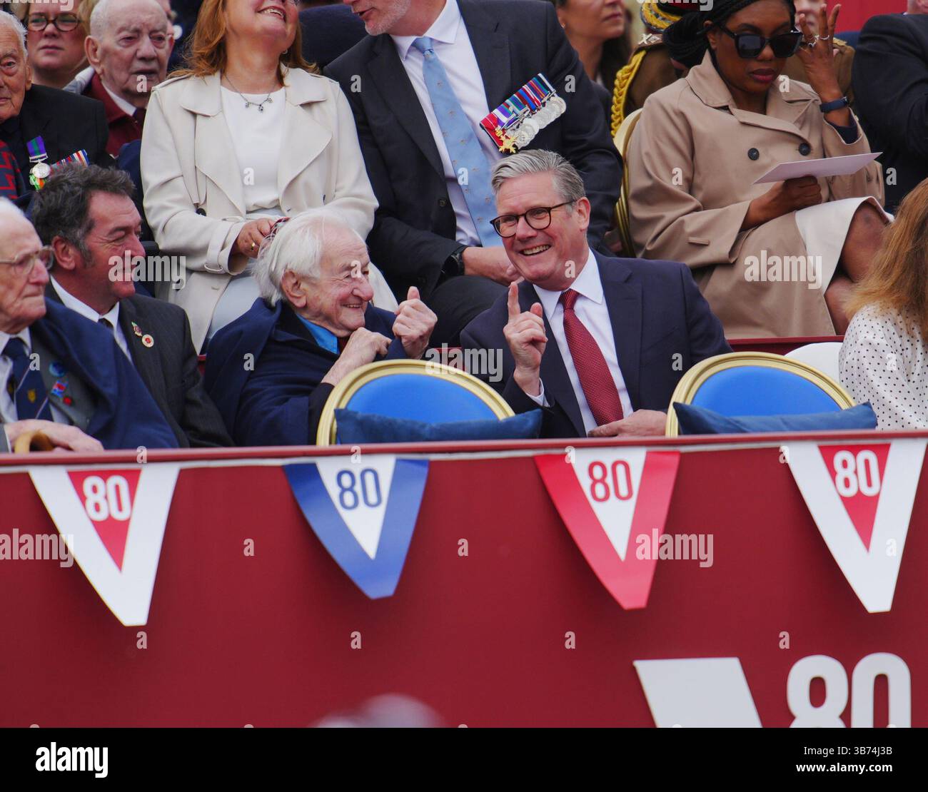 Britain's Prime Minister Sir Keir Starmer, center, speaks to Second ...