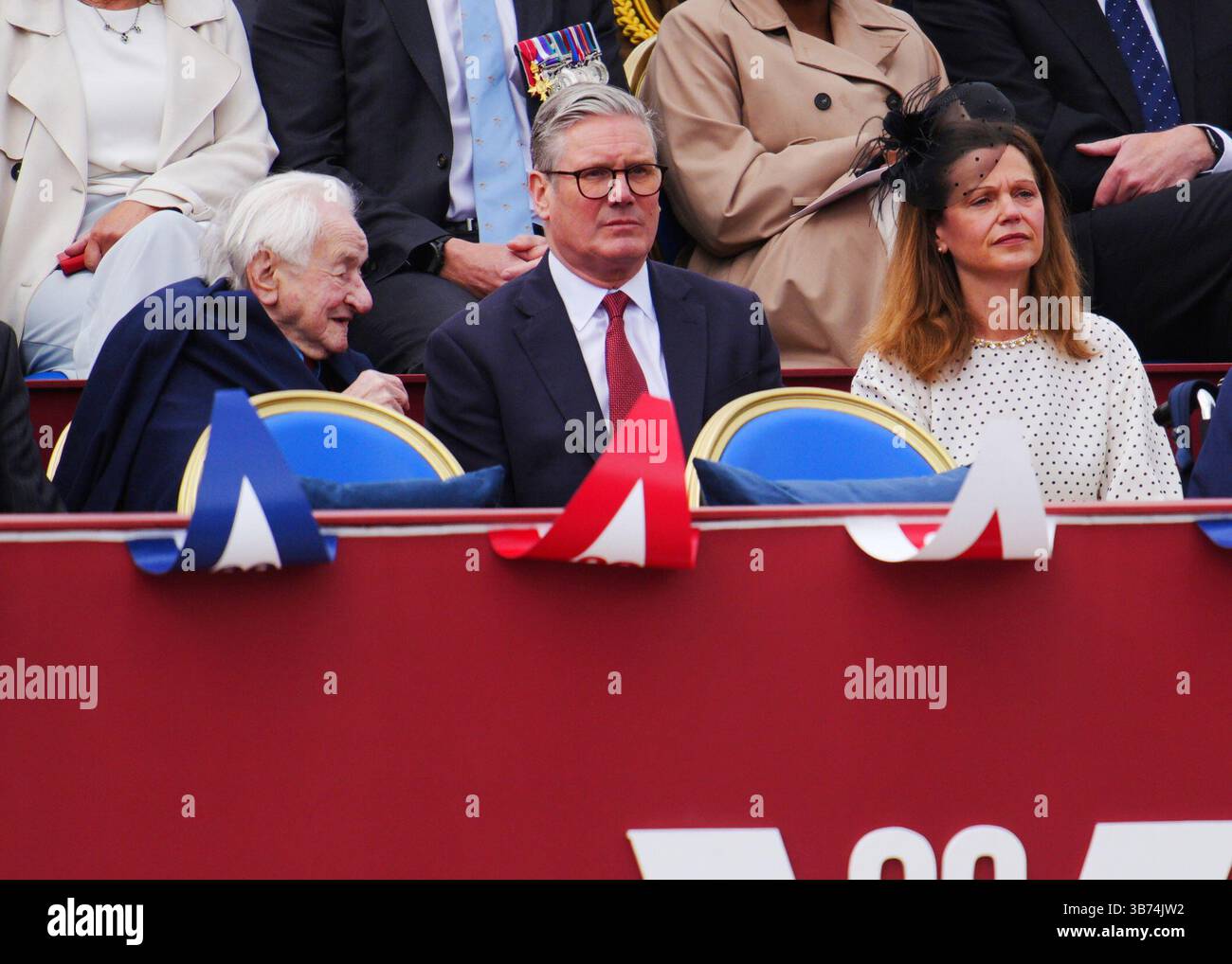 From left, Veteran Albert Keir, Britain's Prime Minister Keir Starmer ...