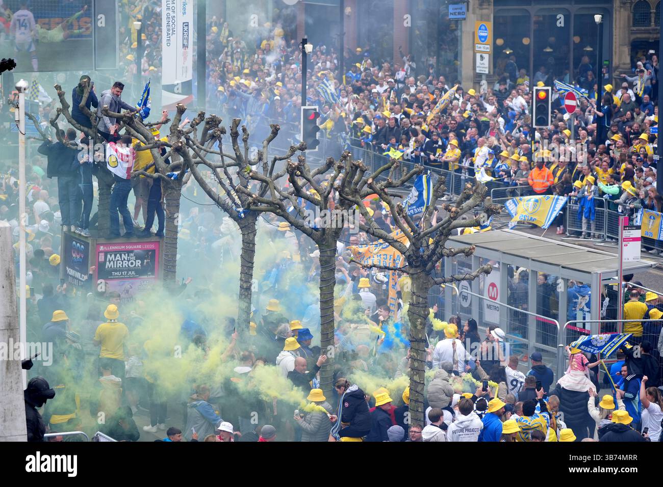 Leeds United fans lining the parade route in the city centre before the ...